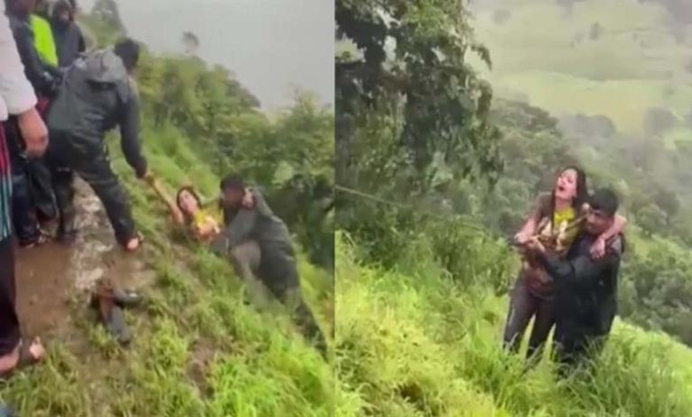 Une femme tombe spectaculairement dans un ravin profond en prenant un ...